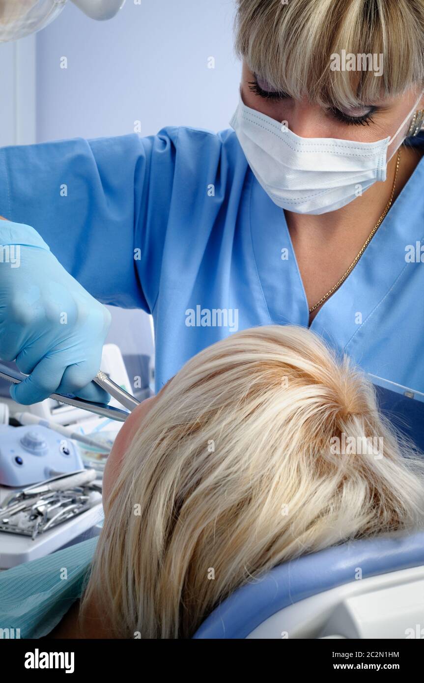 Tooth extraction hi-res stock photography and images - Alamy