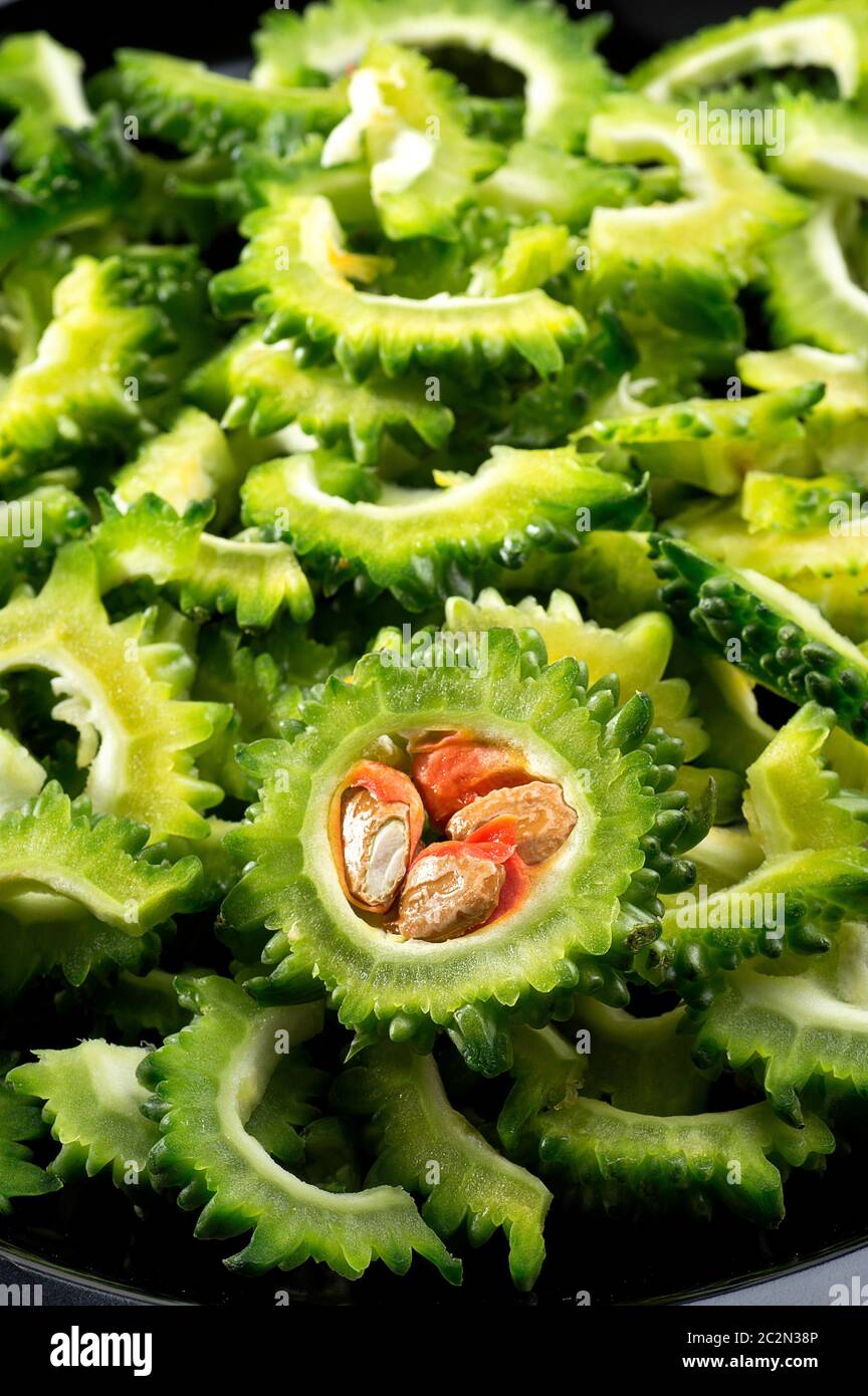 slice of Bitter melon or bitter gourd. Close up of sliced Bitter melon ...