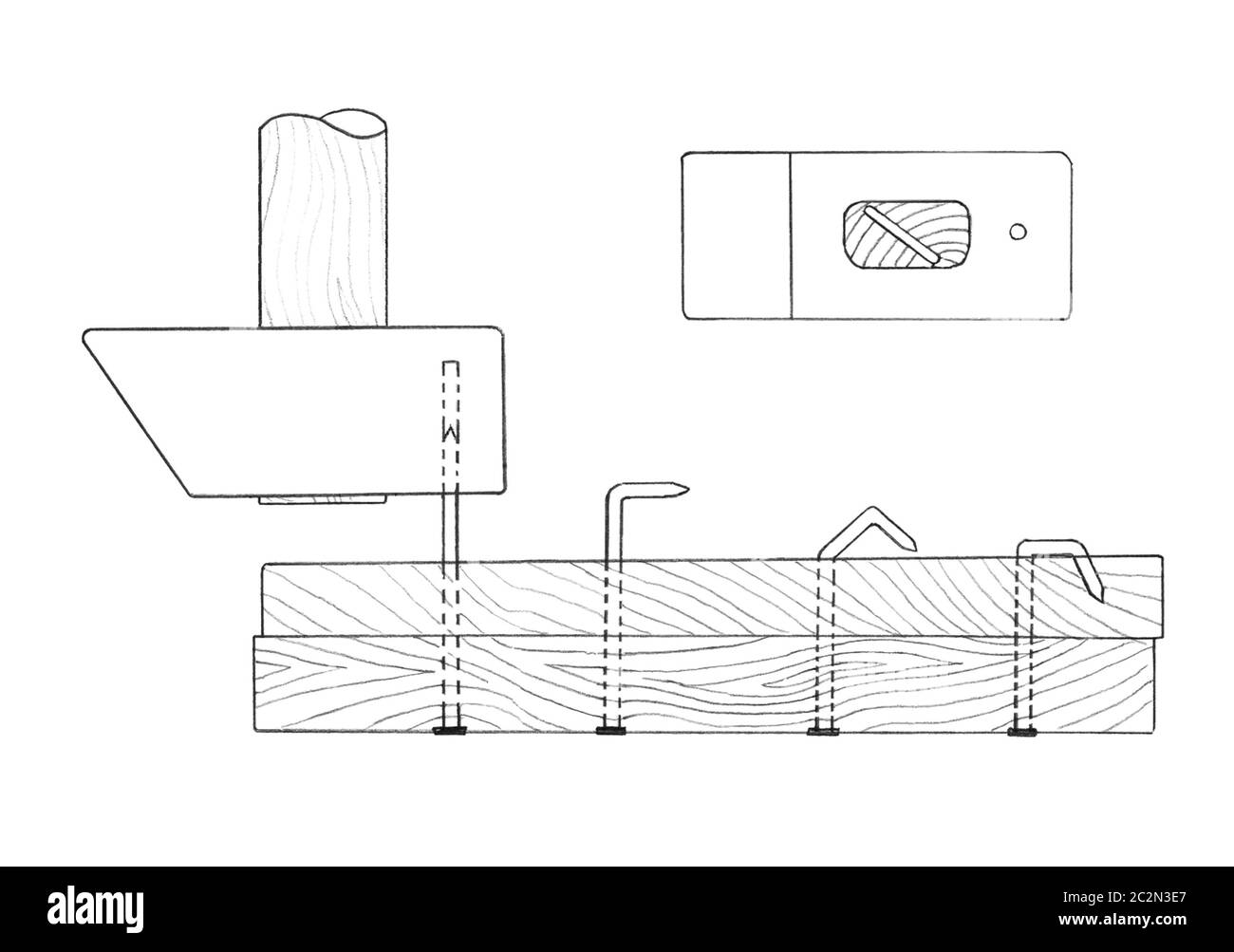 Bending of nails through holes drilled in gavel Stock Photo - Alamy