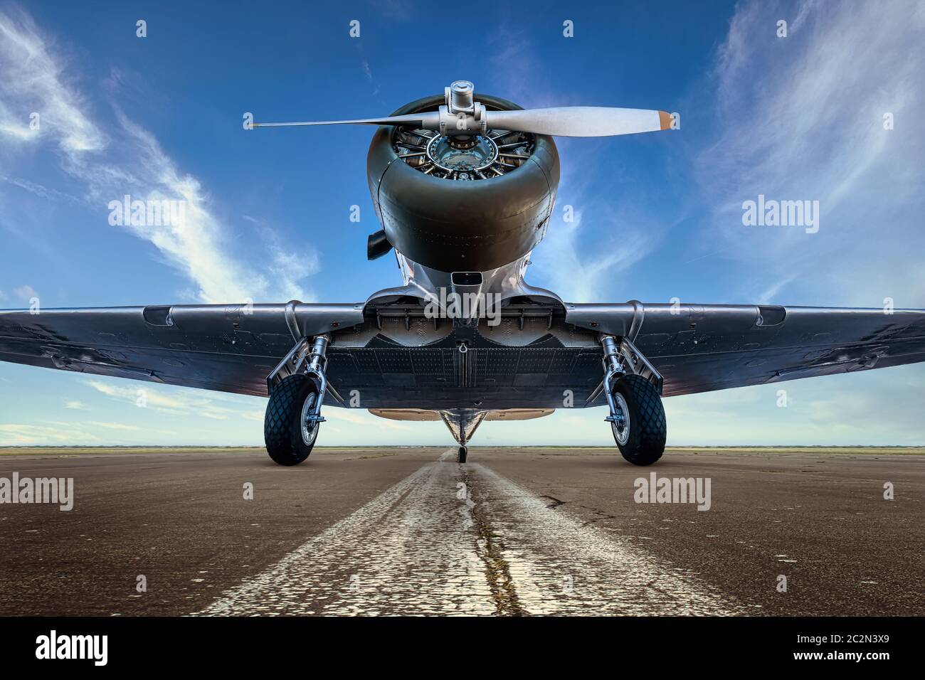 sports plane on a runway waiting for take off Stock Photo - Alamy