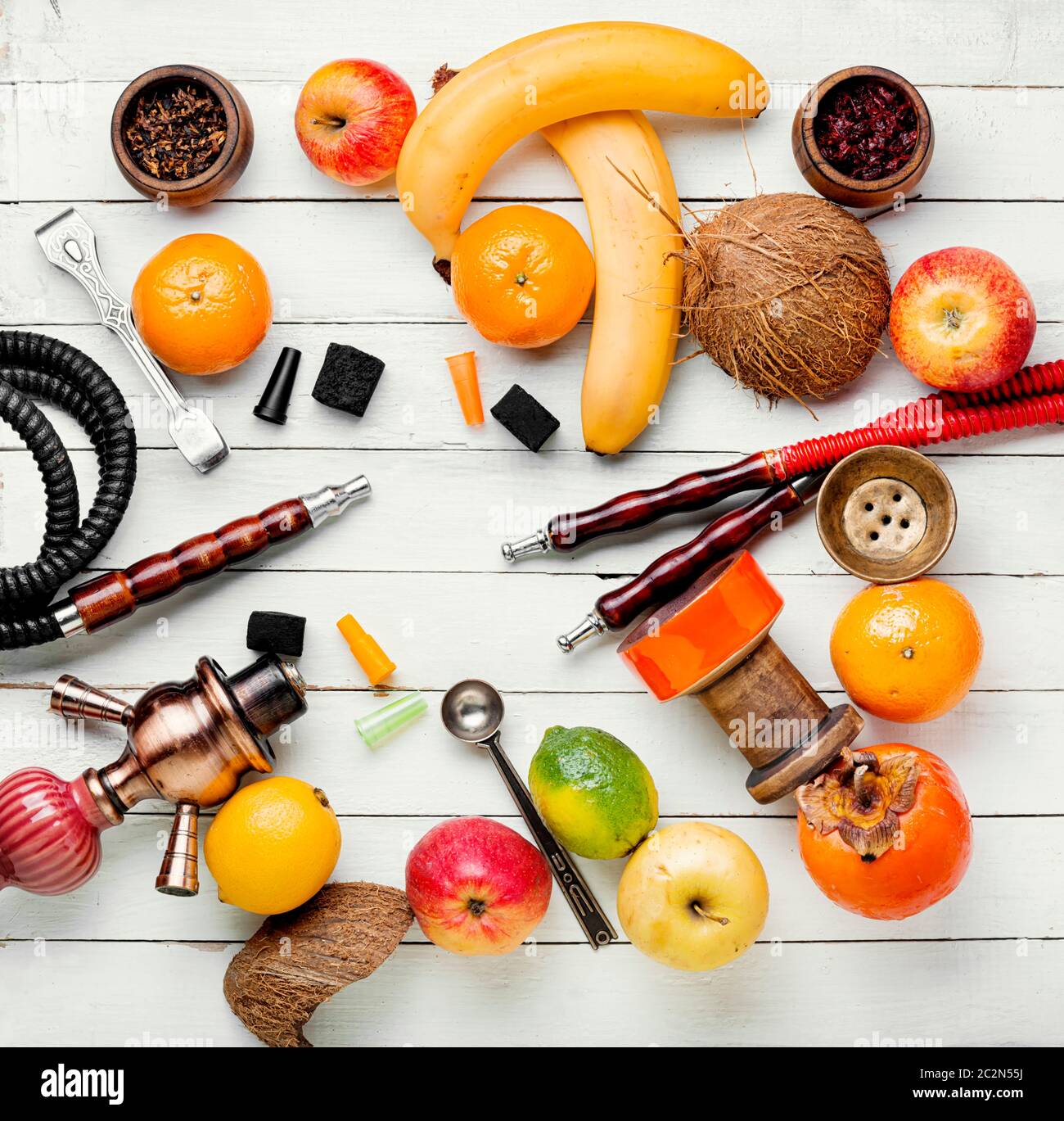 Oriental smoking shisha.Details of a hookah and fruit smoking tobacco ...