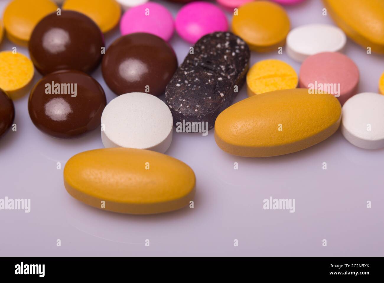 different Tablets pills capsule heap mix therapy drugs Stock Photo - Alamy