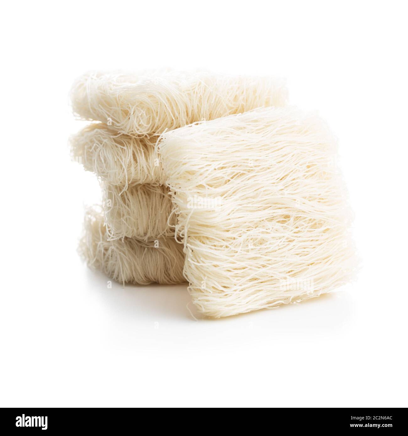 Uncooked white rice noodles isolated on white background Stock Photo ...