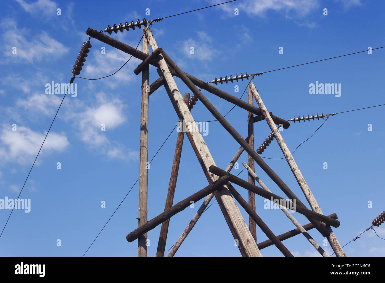 Wooden pillar of electricity transmission line Stock Photo - Alamy