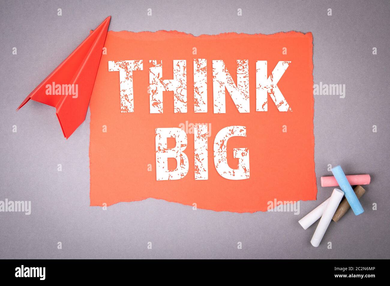 THINK BIG. Motivation and inspiration concept. Text on note sheet ...