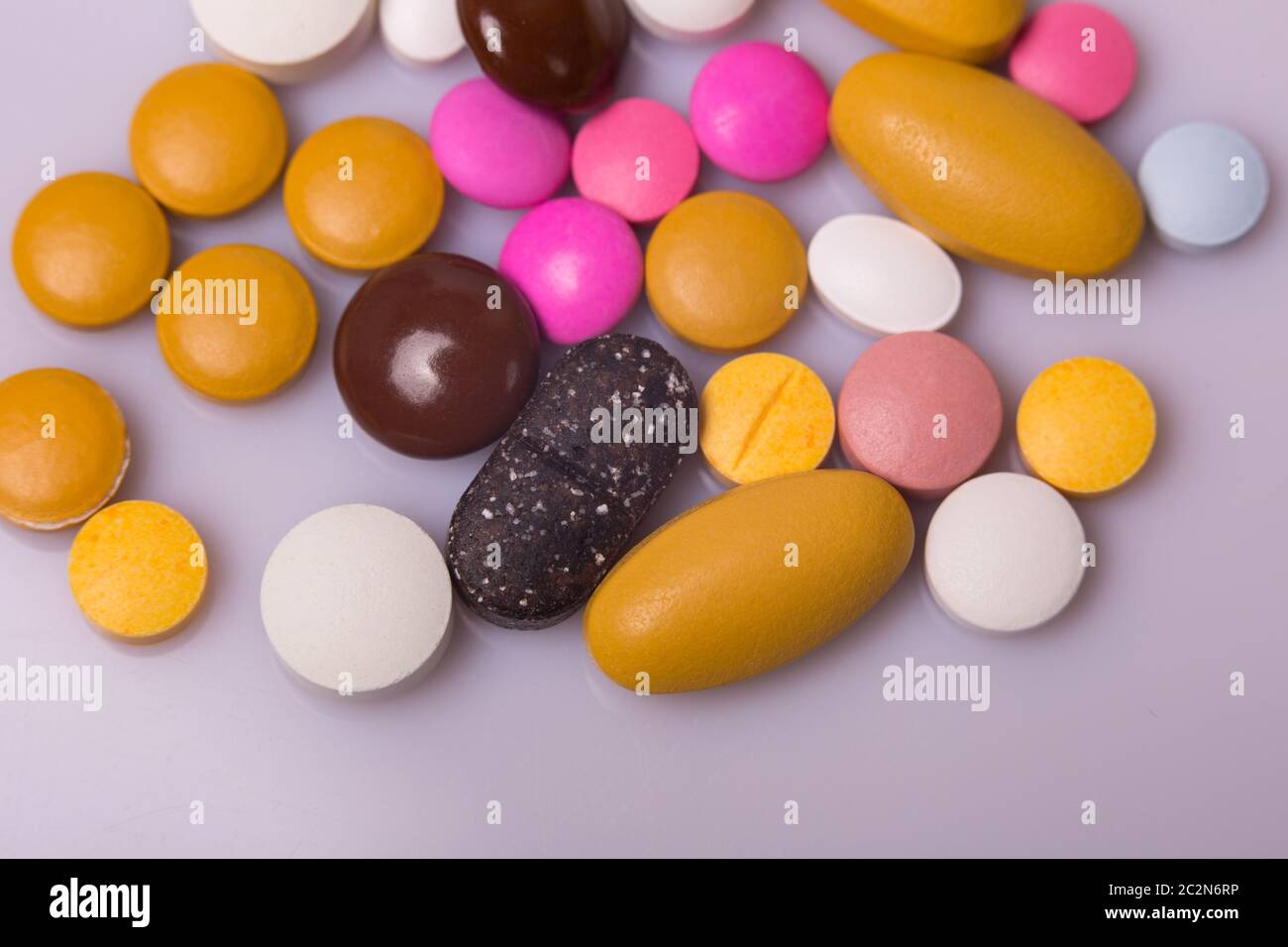 different Tablets pills capsule heap mix therapy drugs Stock Photo - Alamy