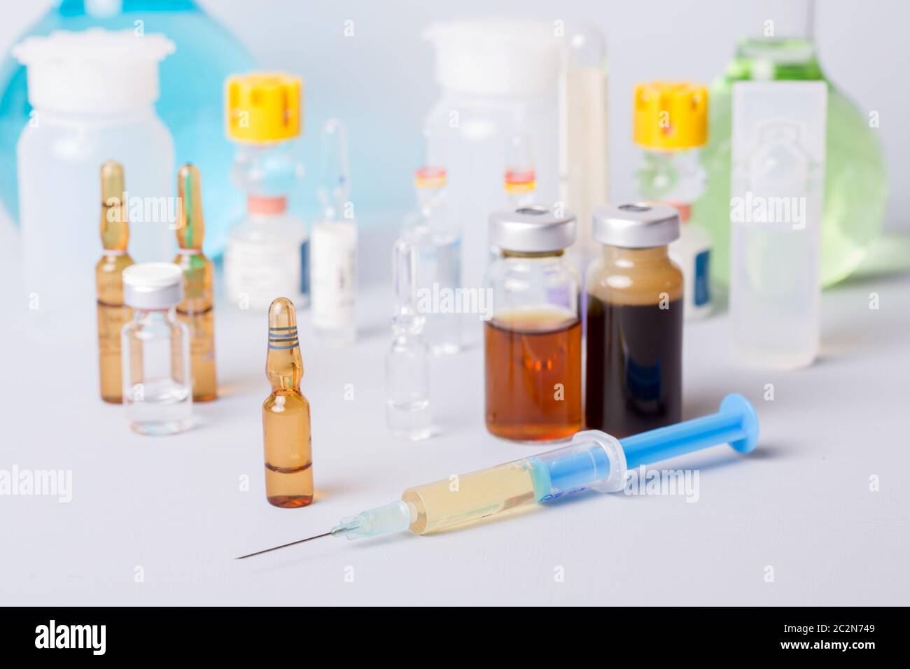 syringe with ampules of drugs Stock Photo - Alamy