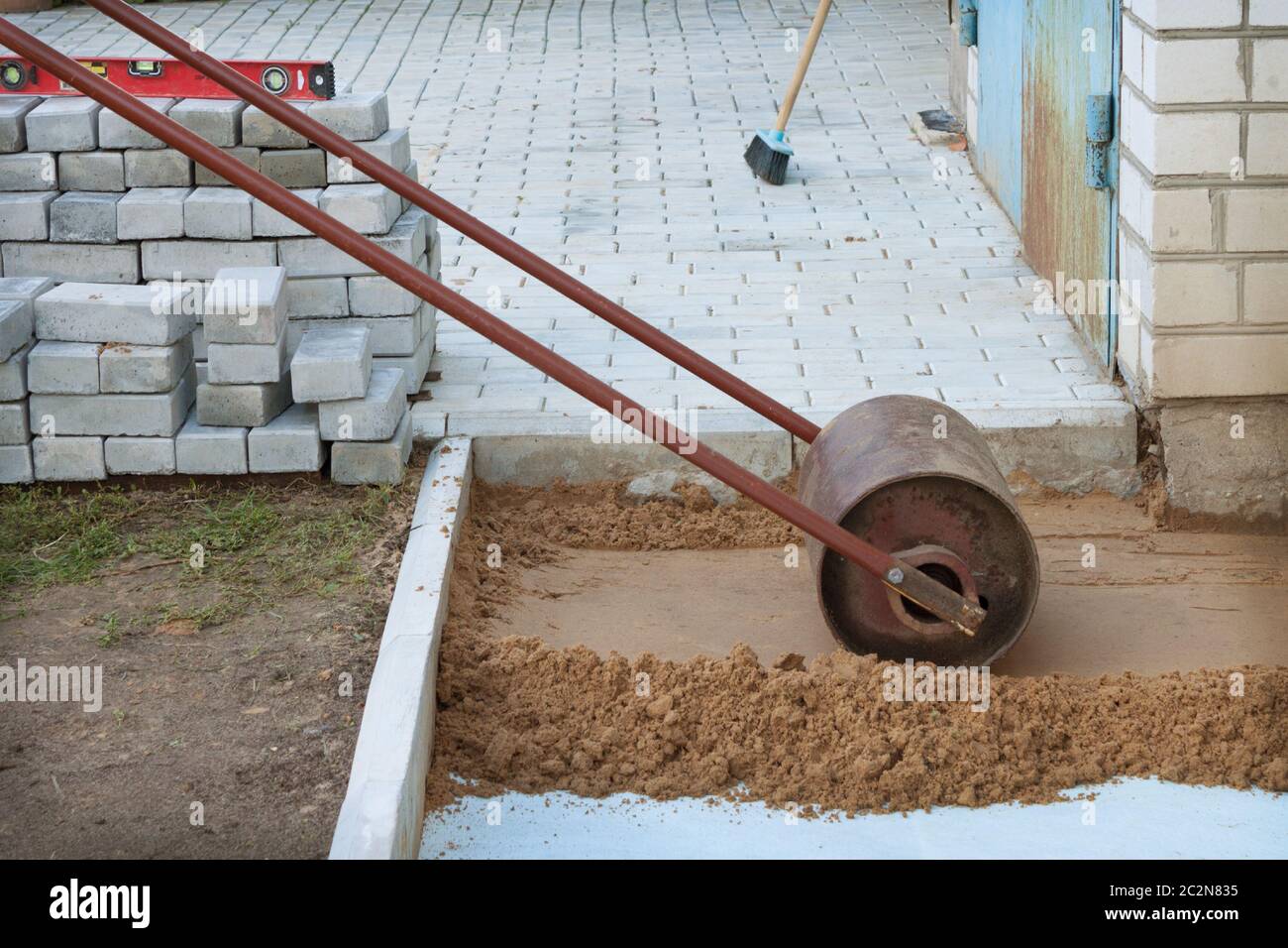 Roller compaction of soil Stock Photo - Alamy