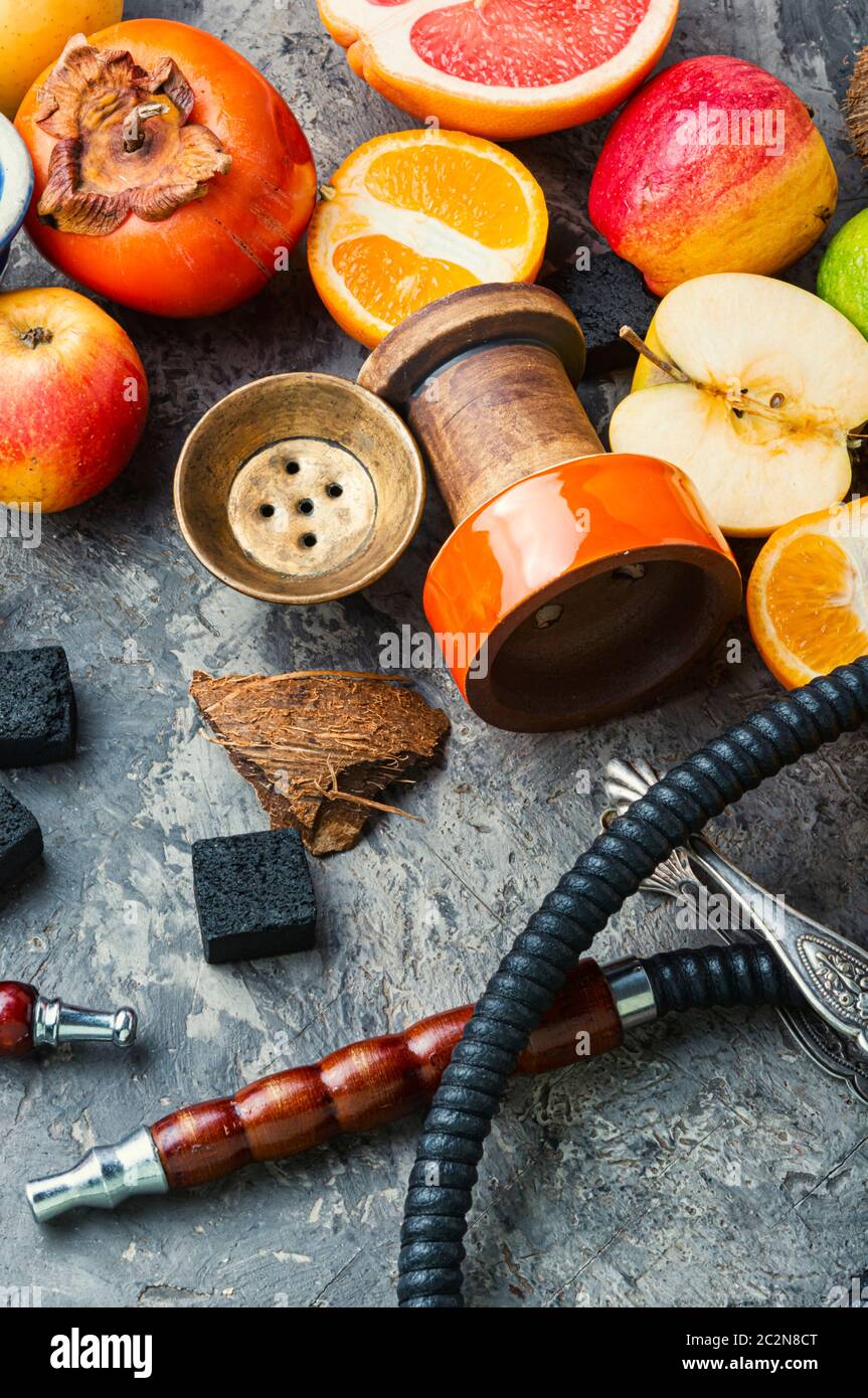 Hookah and fruit smoking tobacco.Smoking hookah for relaxation Stock ...