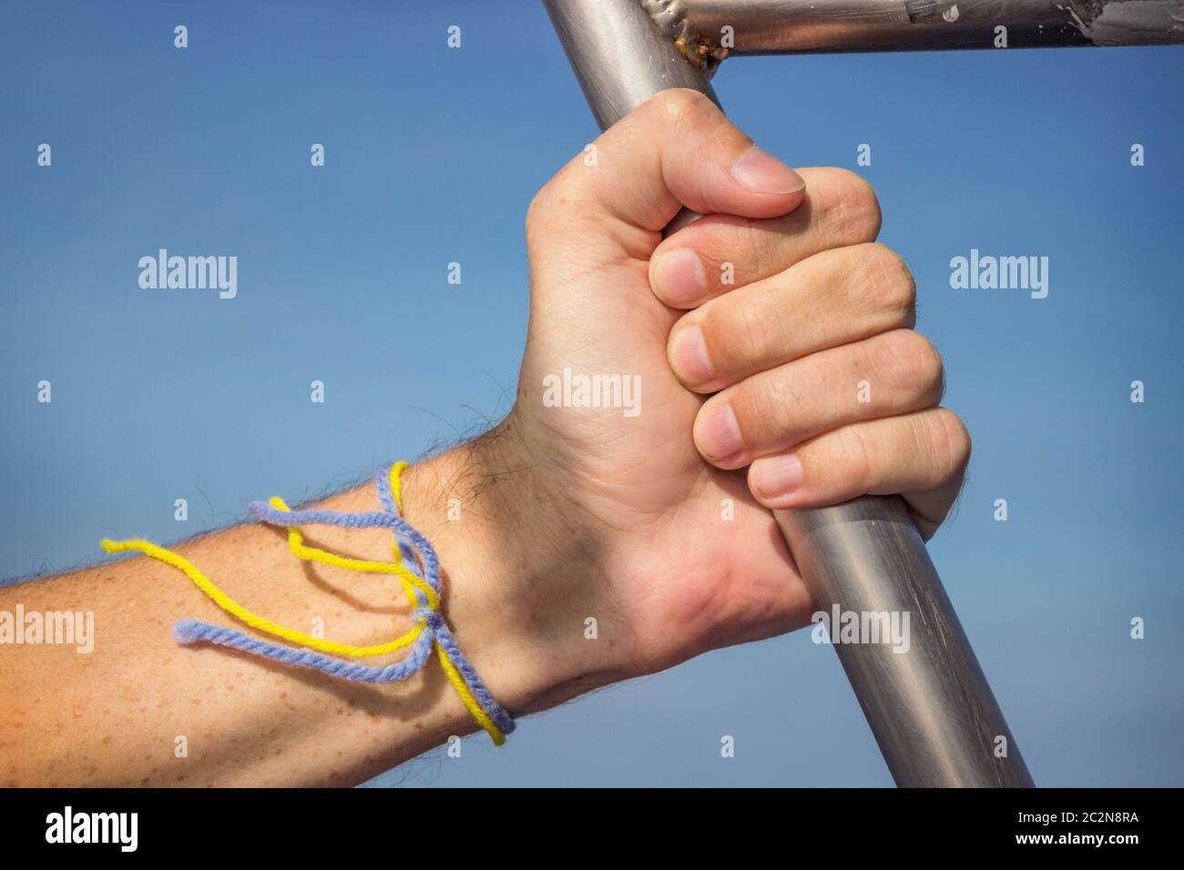 Hand on handrail in ship sailing Stock Photo - Alamy