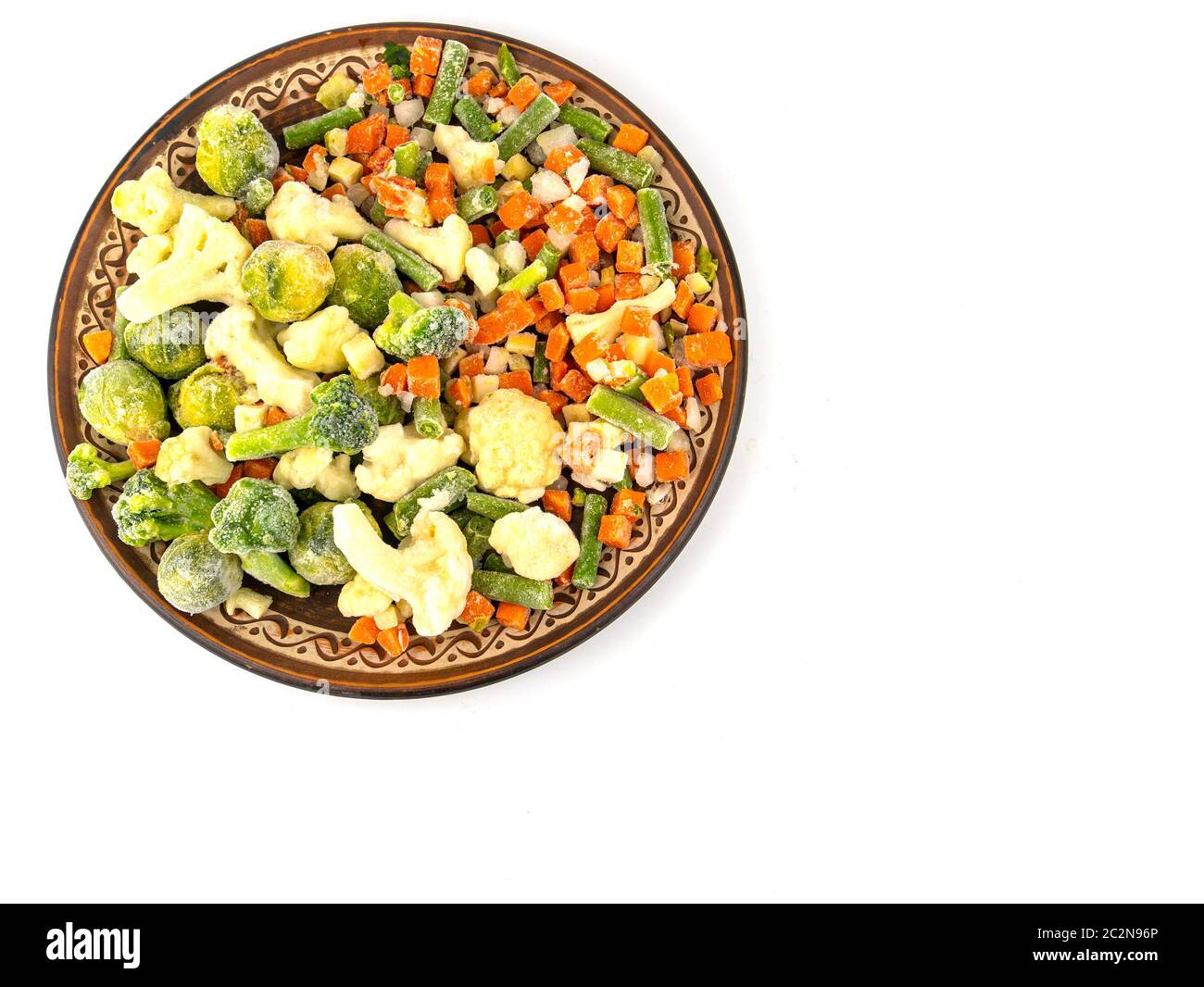Sliced frozen vegetables on a white background. Food photo Stock Photo ...