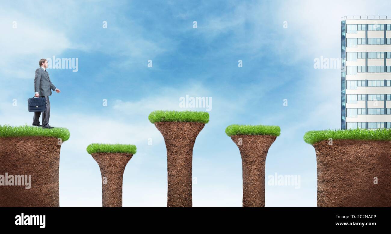 Young man stepping up for success hi-res stock photography and images ...