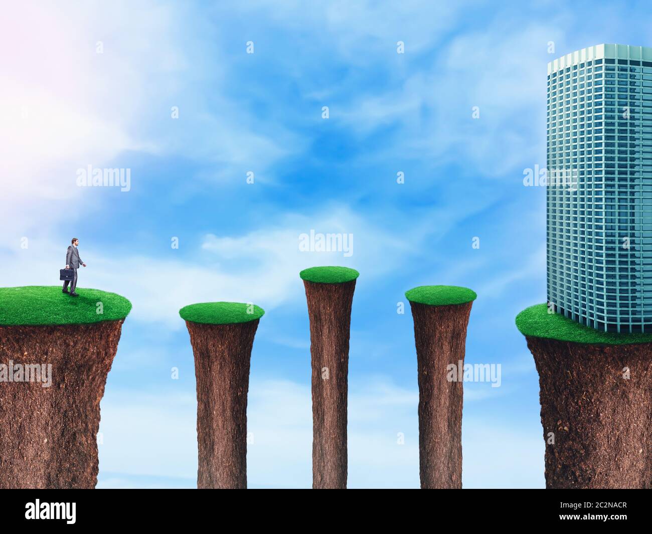 Businessman stepping up on the separated grass hills to the office ...