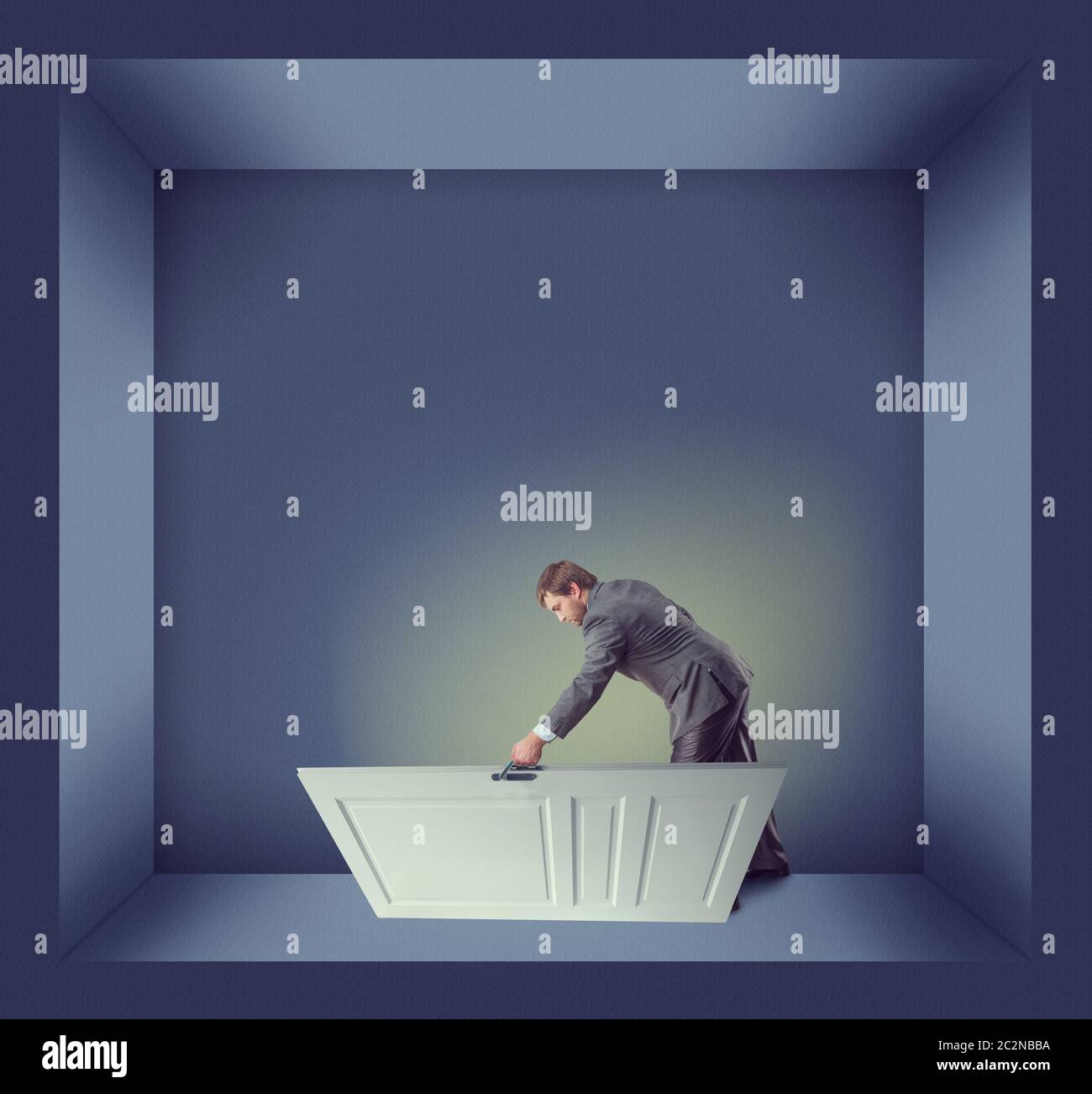 Businessman is opening the door to out Stock Photo - Alamy