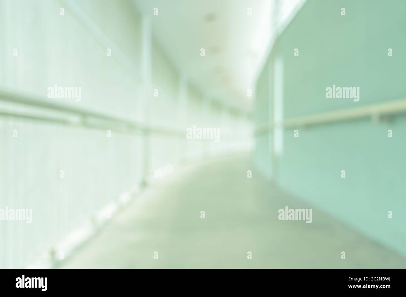 Blurred image background tunnel empty curve corridor Stock Photo - Alamy
