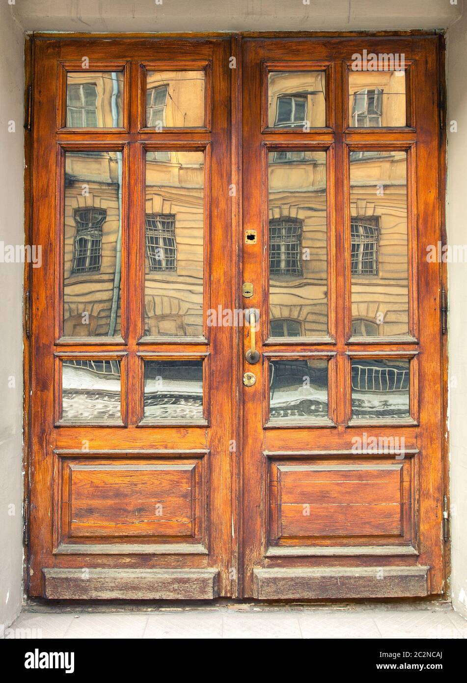 Old weathered wooden door with distorted reflection Stock Photo - Alamy