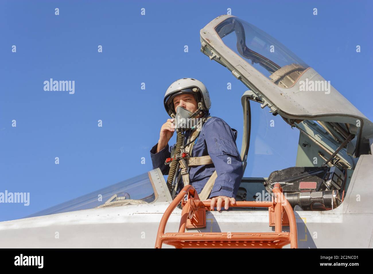 Military pilot in the cockpit of a jet aircraft Stock Photo - Alamy
