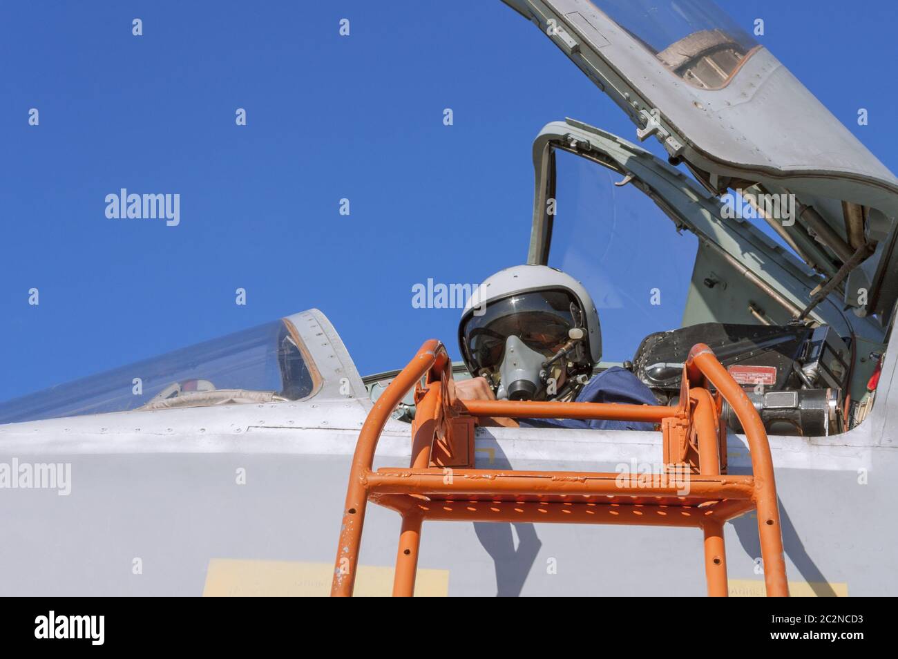 Military pilot in the cockpit of a jet aircraft Stock Photo - Alamy