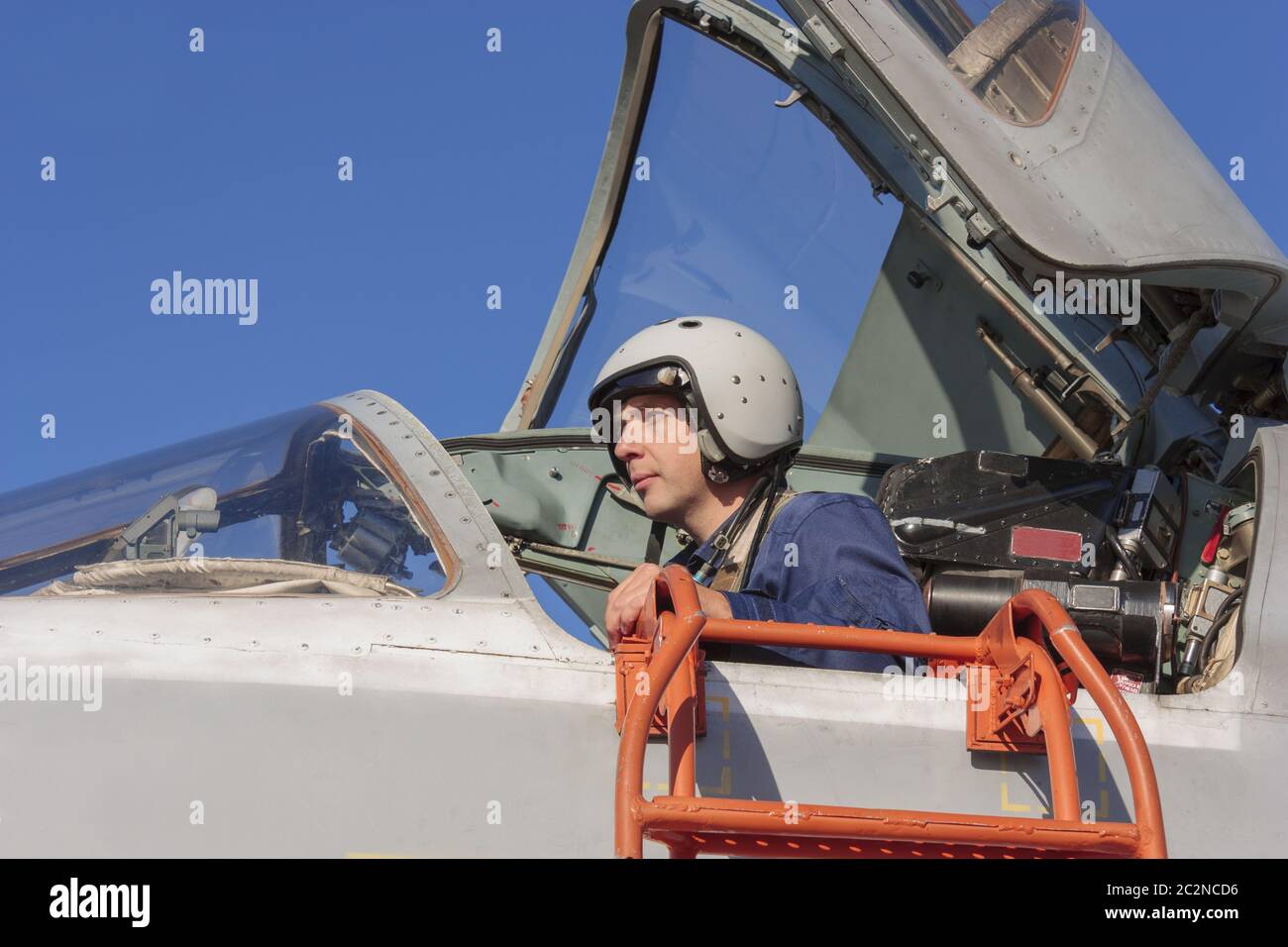 Military pilot in the cockpit of a jet aircraft Stock Photo - Alamy