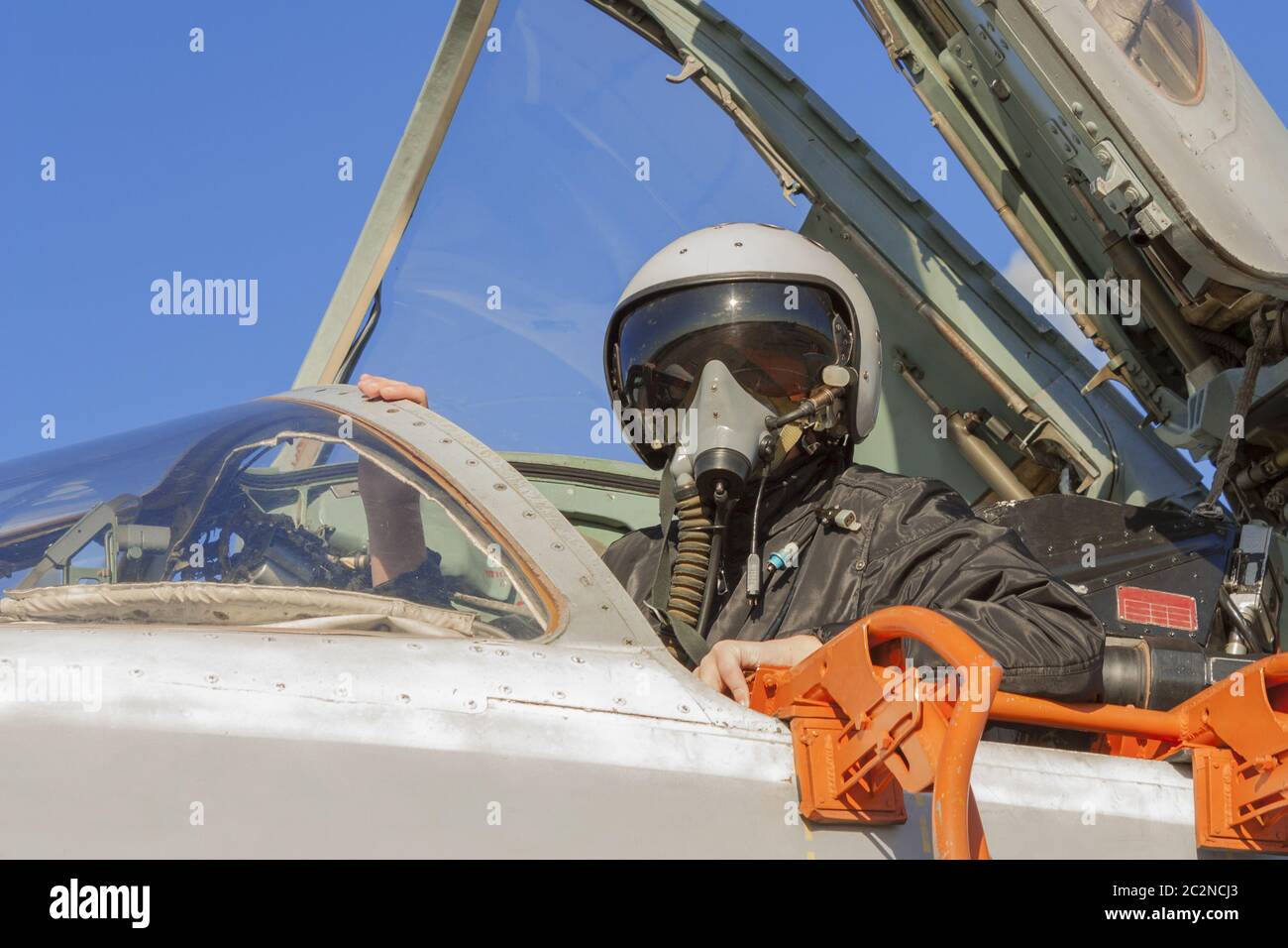 Military pilot in the cockpit of a jet aircraft Stock Photo - Alamy