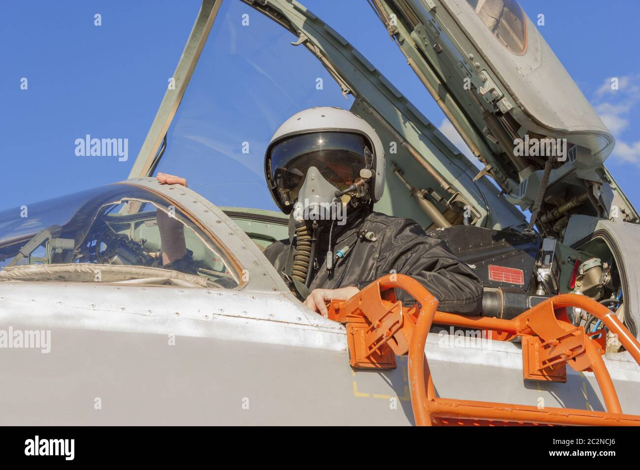 Military pilot in the cockpit of a jet aircraft Stock Photo - Alamy
