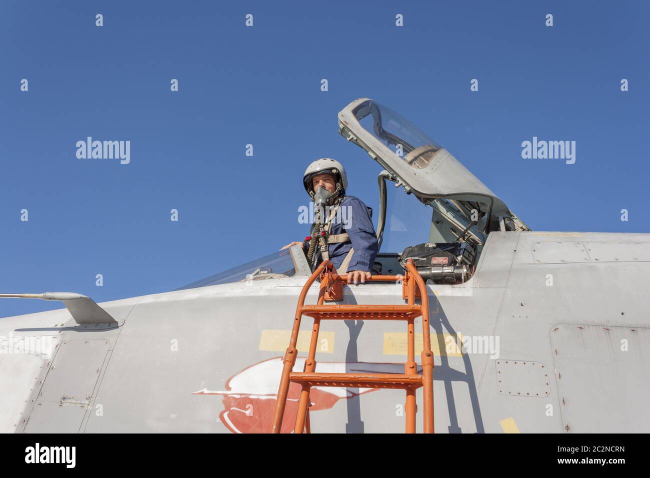 Military pilot in the cockpit of a jet aircraft Stock Photo - Alamy