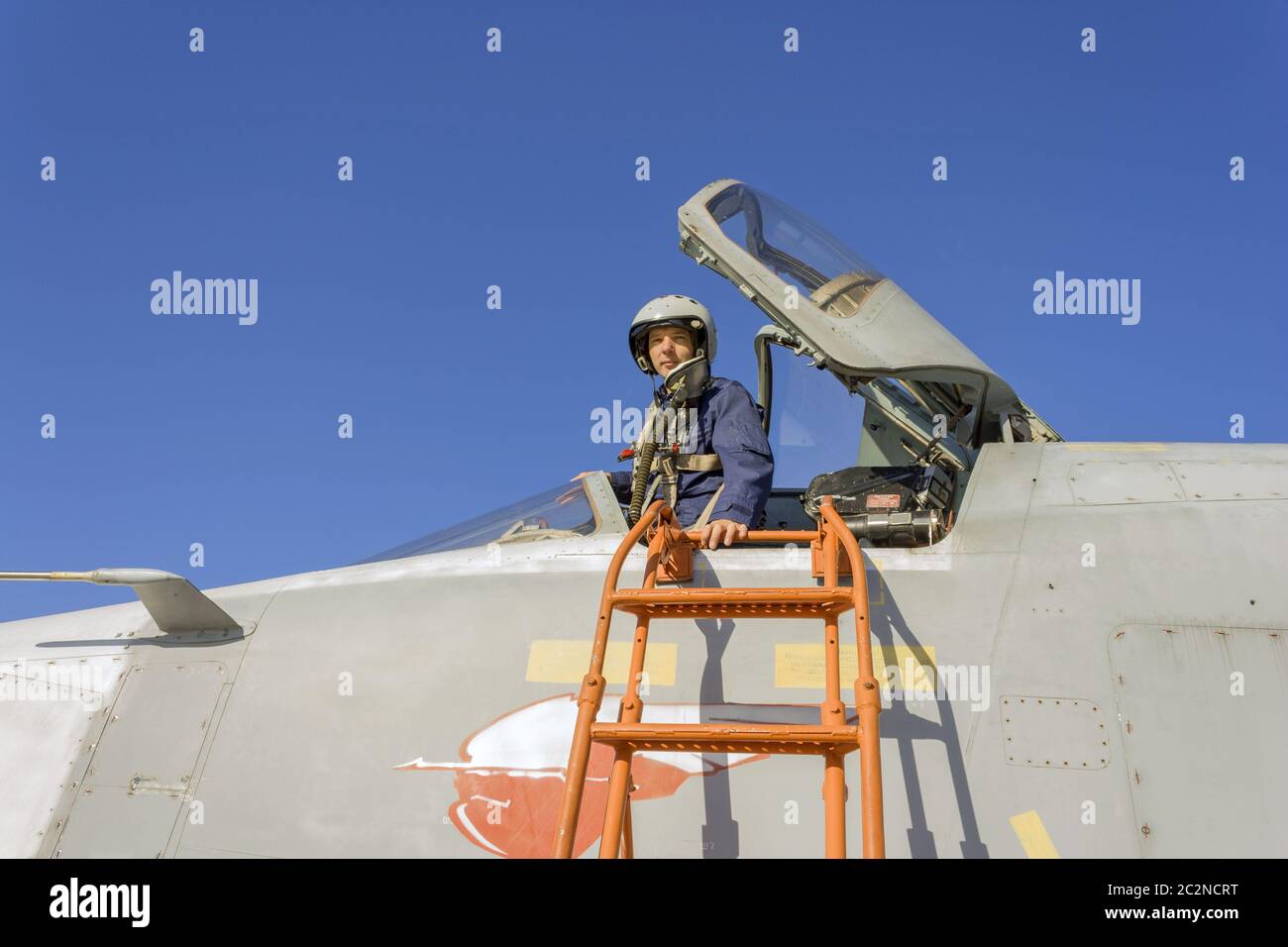 Military pilot in the cockpit of a jet aircraft Stock Photo - Alamy