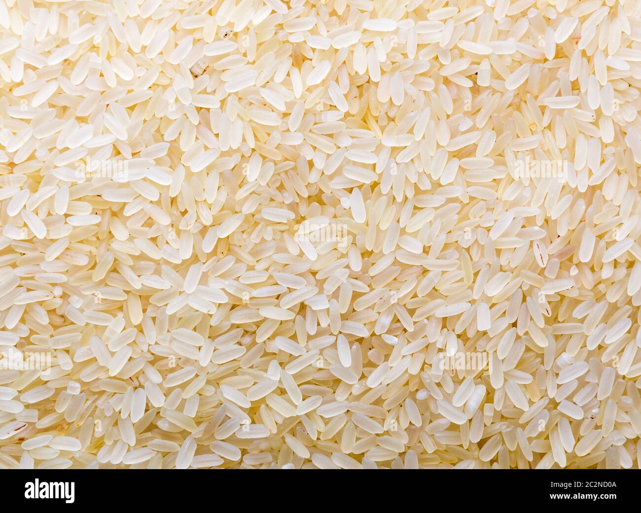 Closeup of white rice background Stock Photo - Alamy