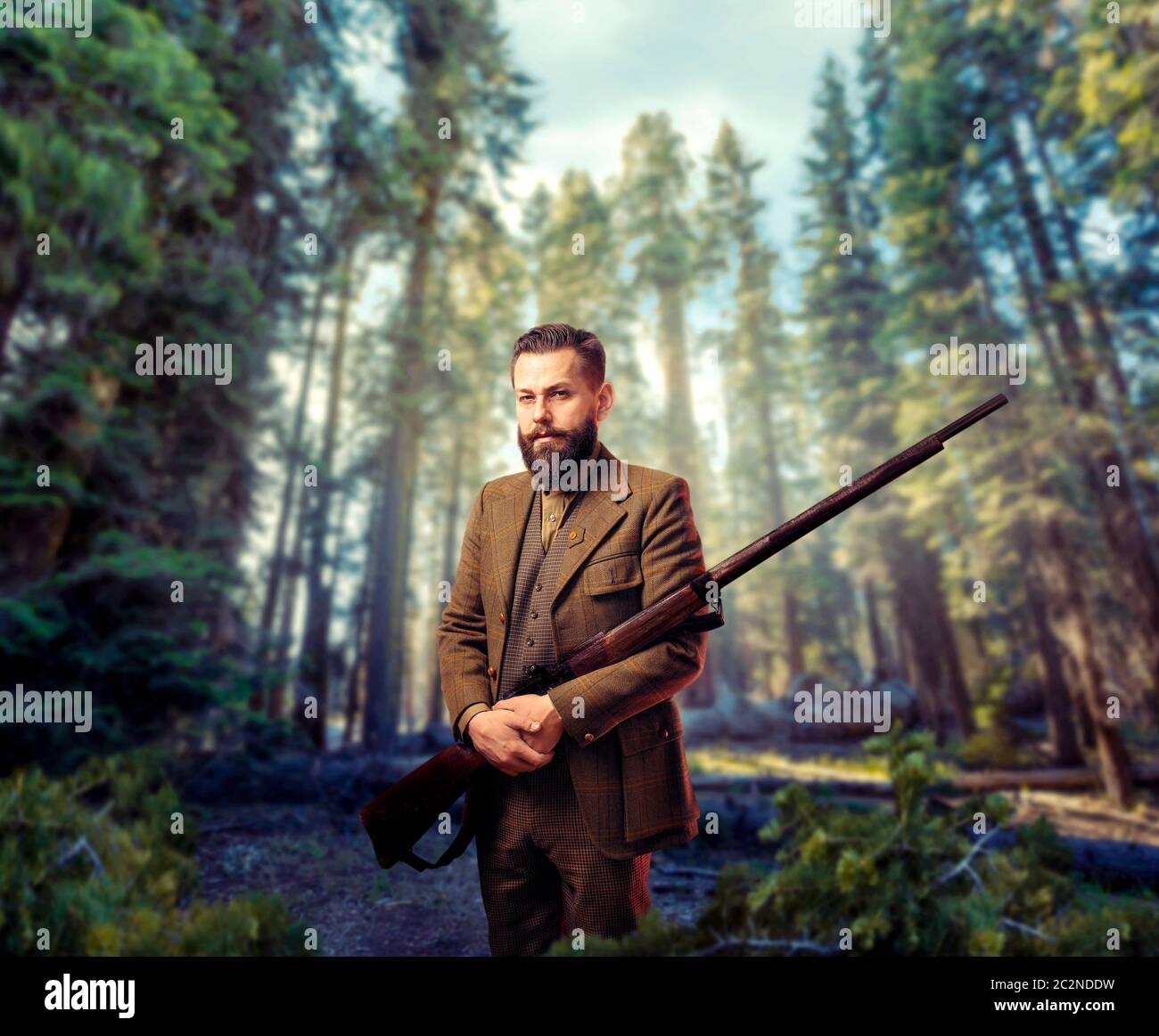 Portrait of breaded hunter man in vintage hunting clothing with old gun ...