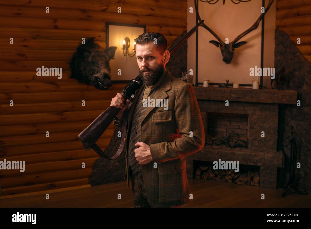 Respectable hunter man in vintage stylish hunting clothing with antique ...