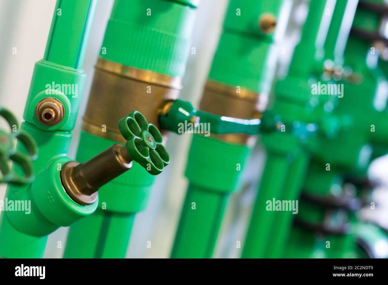 Pipes and valves of heating system Stock Photo - Alamy