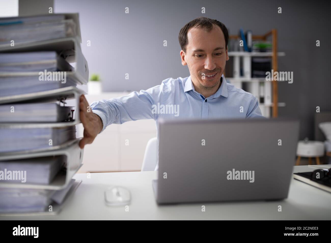 Pushing paper hi-res stock photography and images - Alamy