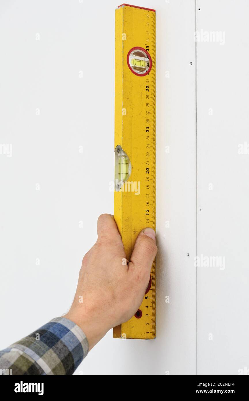 Working with spirit level Stock Photo - Alamy