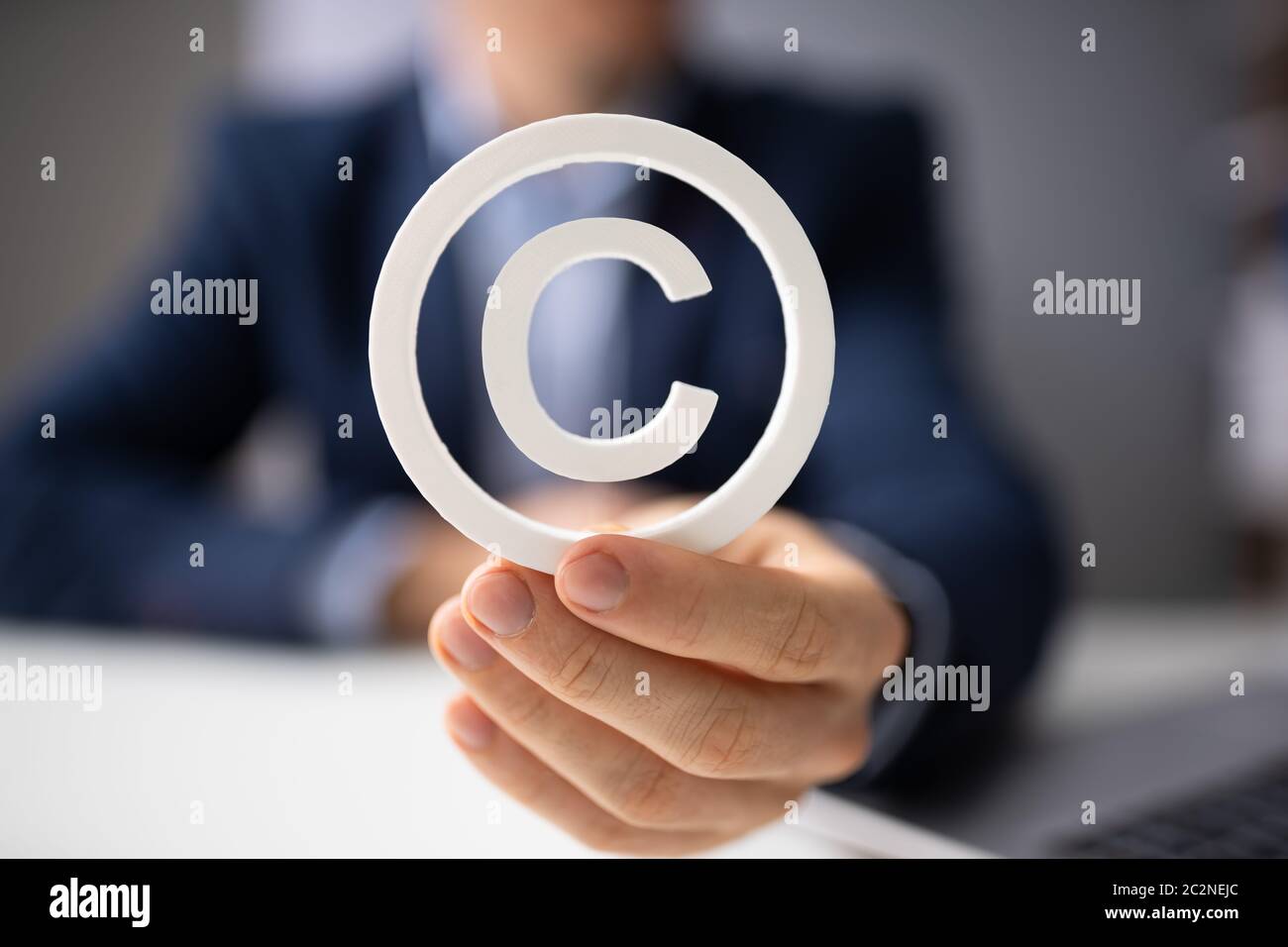 Person Holding White Copyright Sign In Hand Stock Photo - Alamy