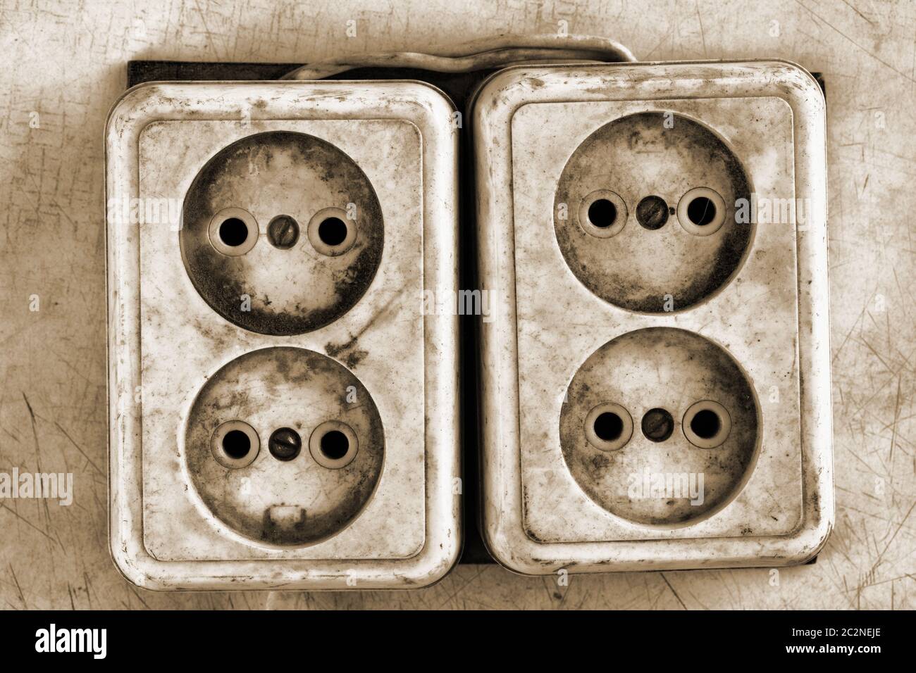 Old dirty electrical outlets on the wall Stock Photo - Alamy