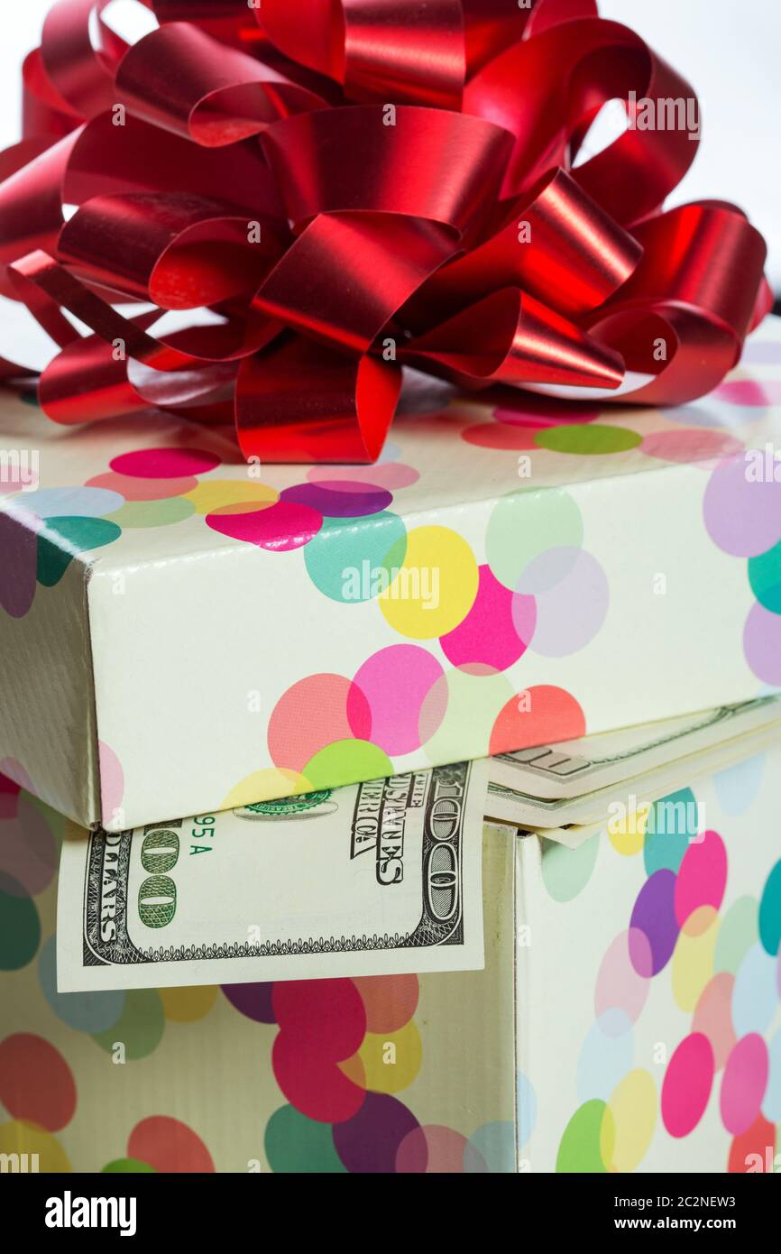 Gift box full of $100 dollar bills Stock Photo - Alamy