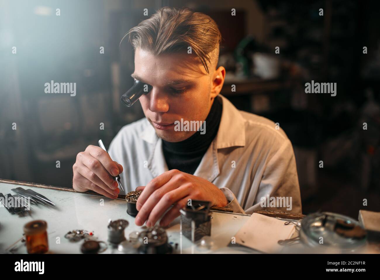 Man repairing watches hi-res stock photography and images - Alamy