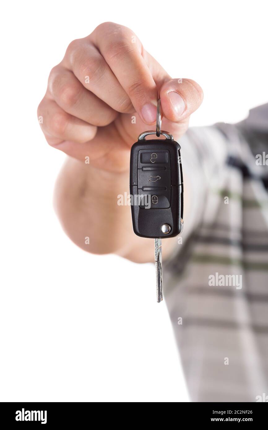 Male hand giving you car key. Isolated on white Stock Photo - Alamy