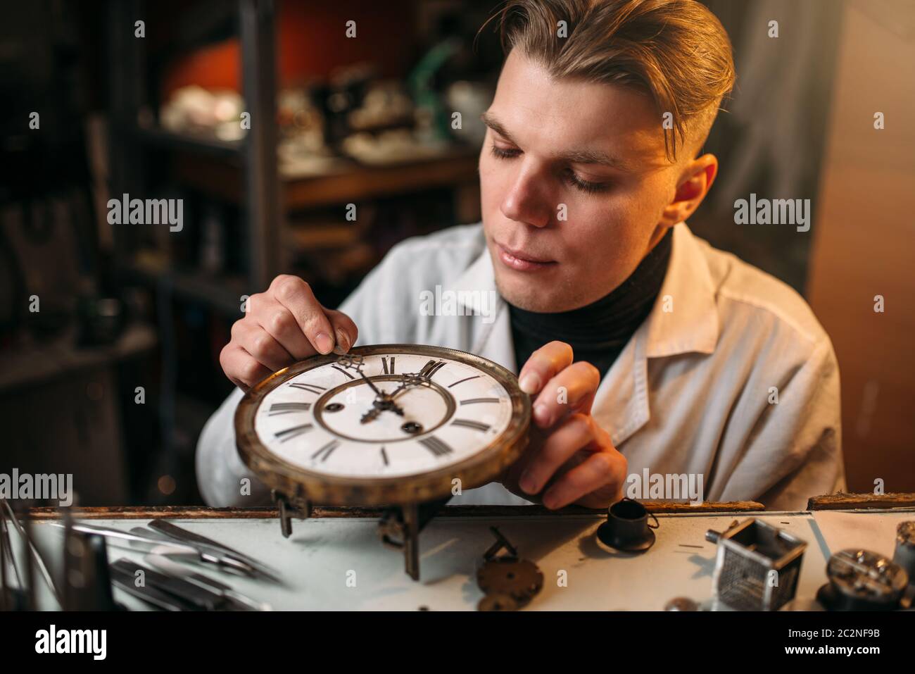 Watchmaker adjusts mechanism old hi-res stock photography and images ...