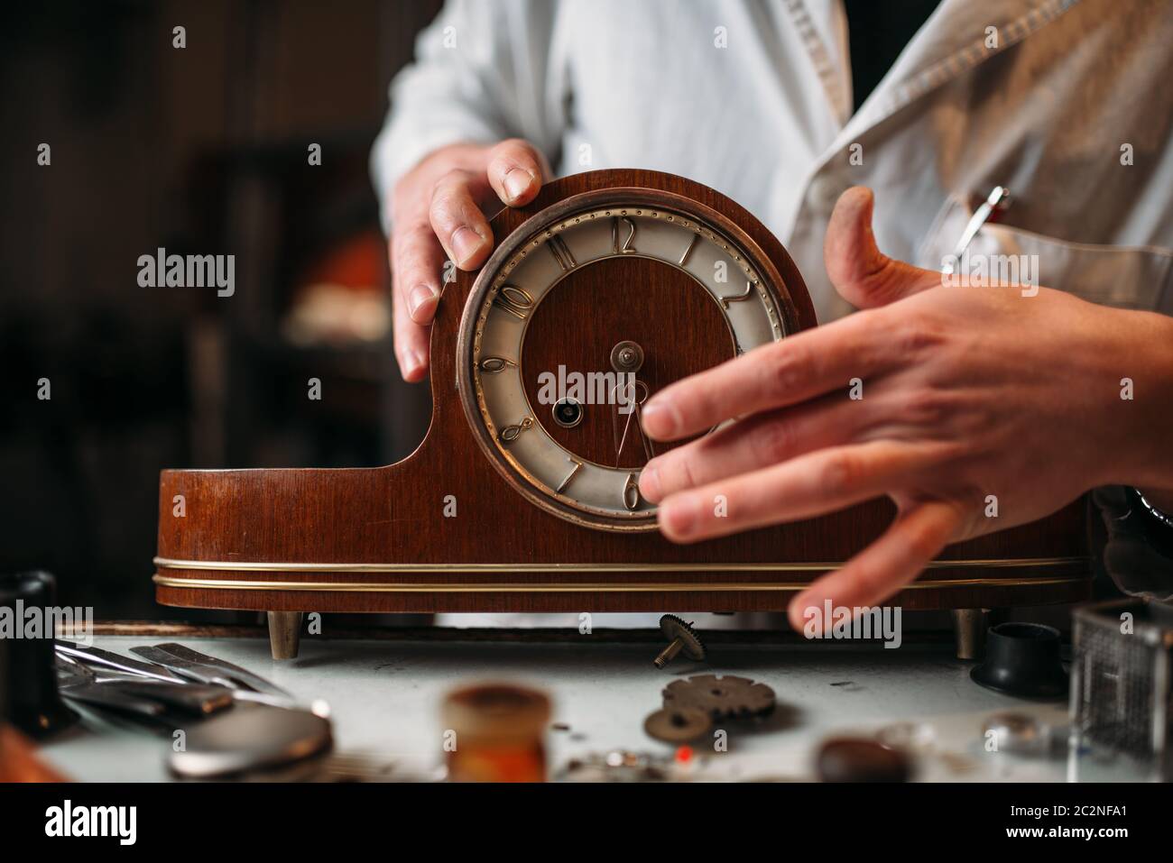 Mechanical wooden man clock hi-res stock photography and images - Alamy