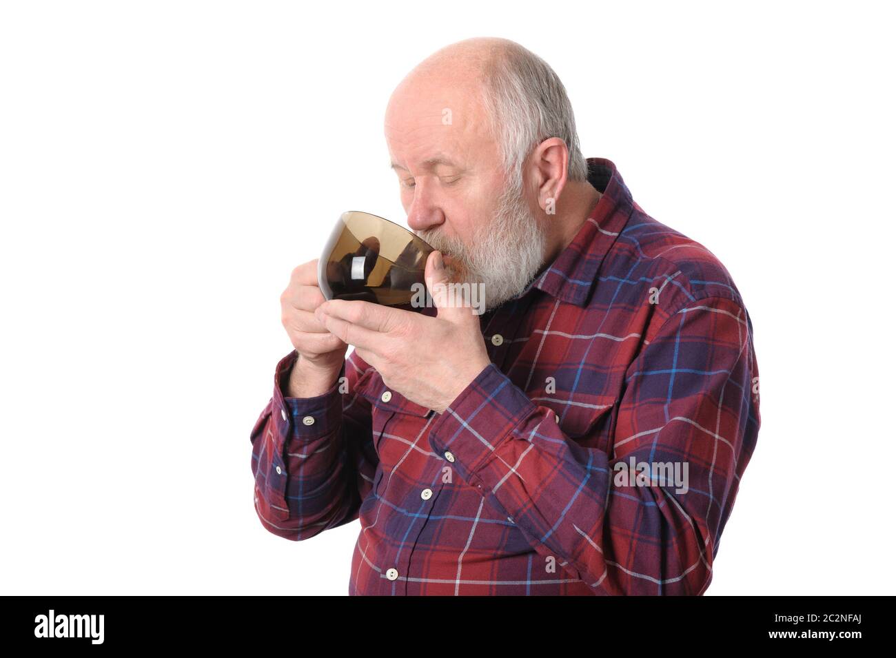 senior man drinking from cup, isolated on white Stock Photo - Alamy