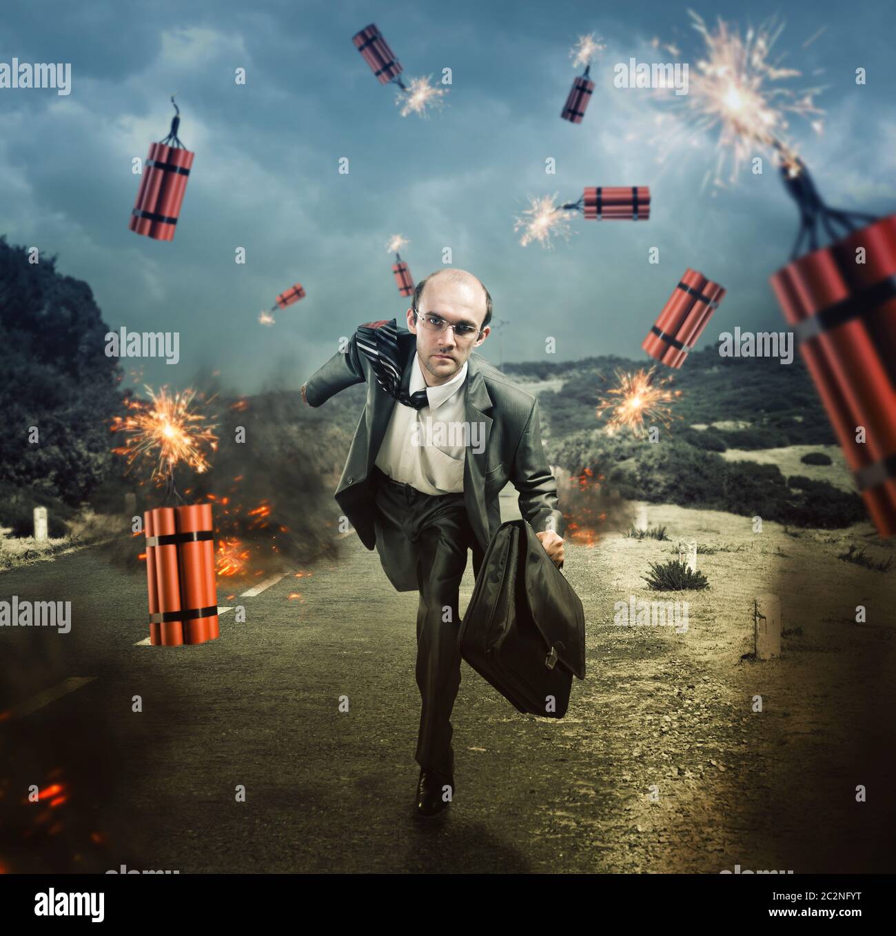 Businessman running from dynamite exploding on the road Stock Photo - Alamy
