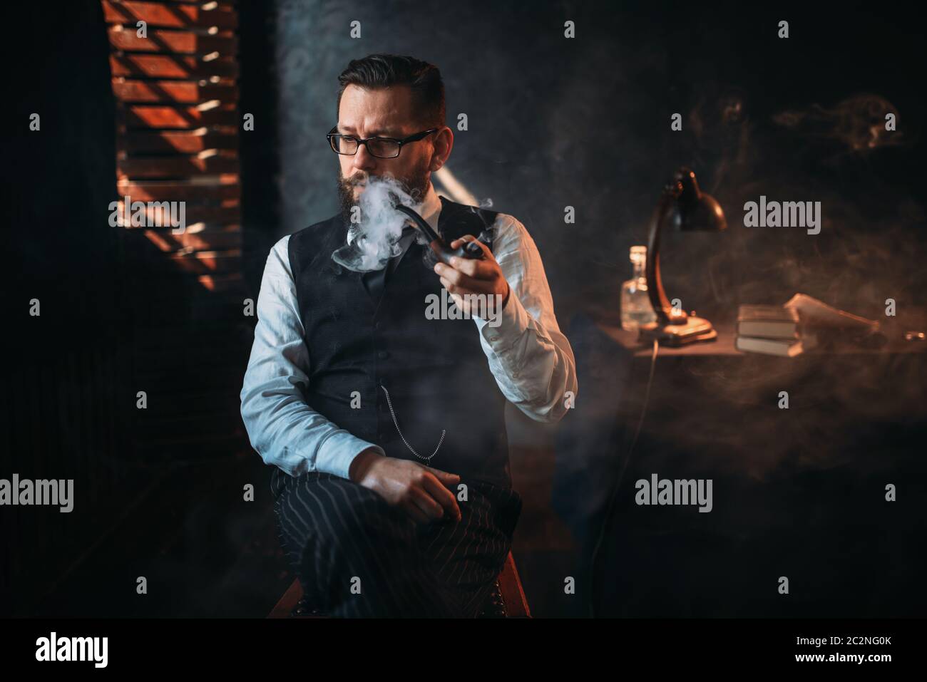 Old journalist smoking hi-res stock photography and images - Alamy