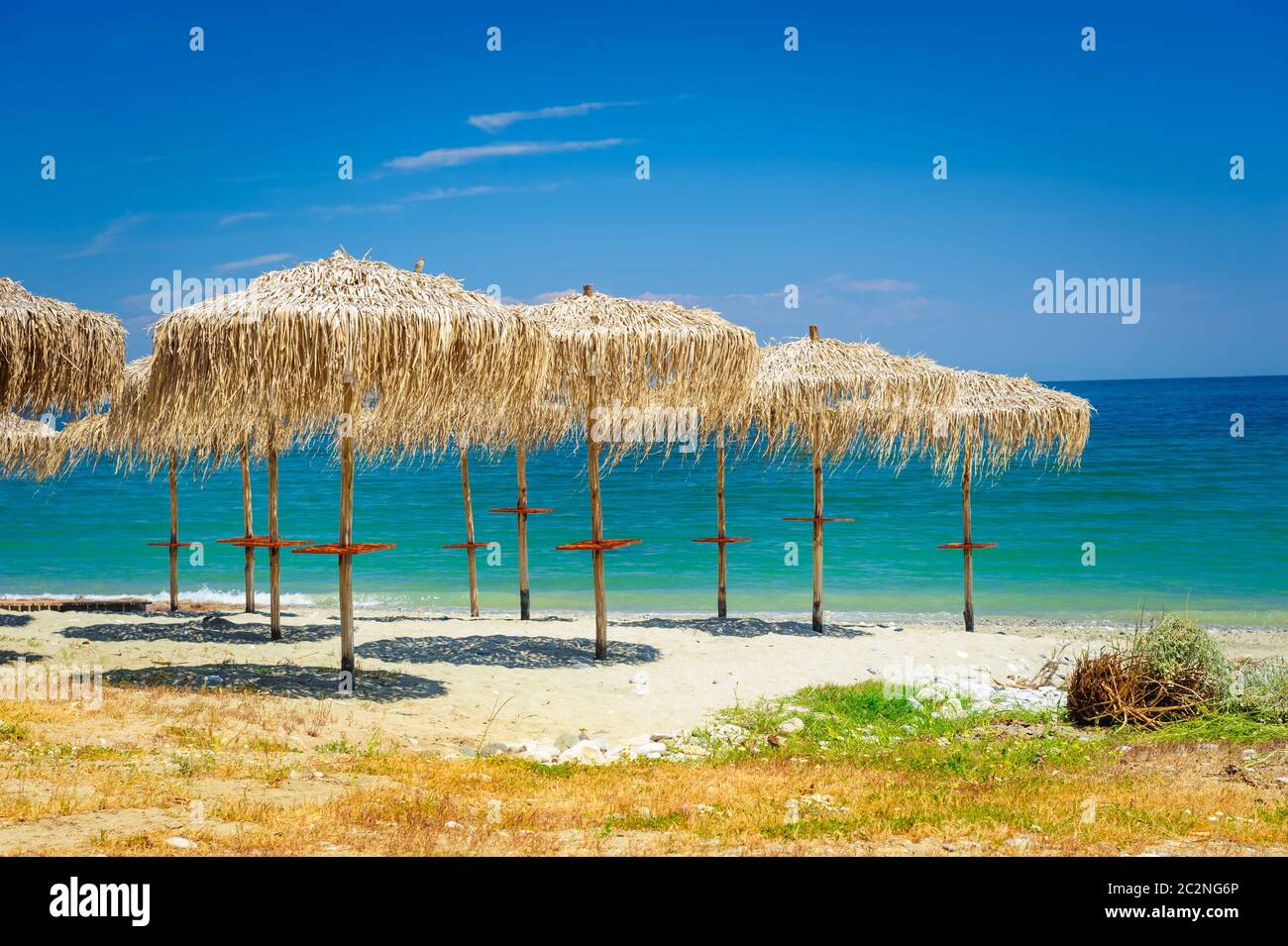 Sun umbrella beach reed hi-res stock photography and images - Alamy