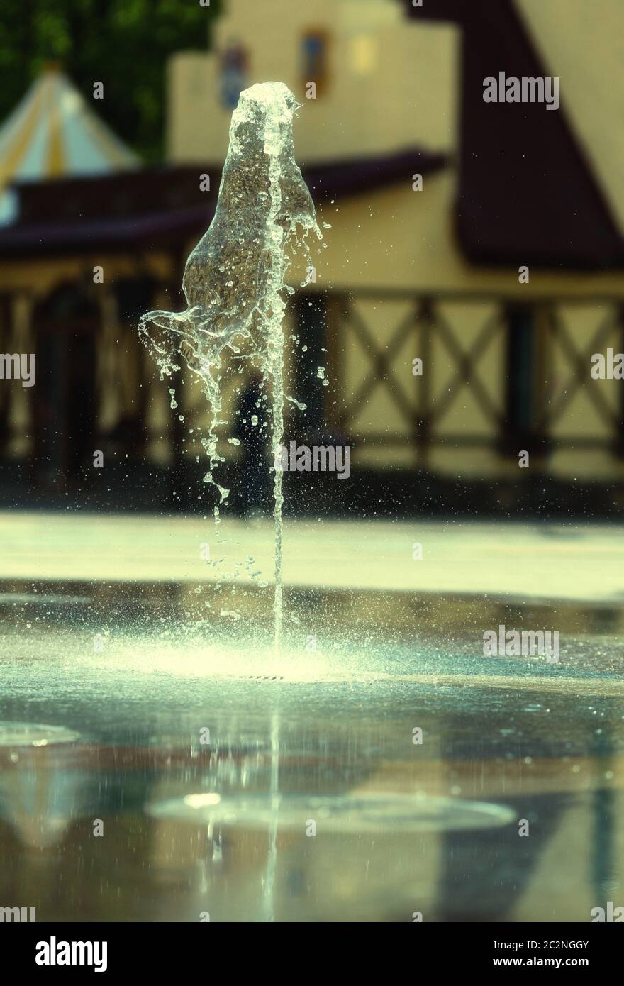 Water stream splashing on ground Stock Photo - Alamy