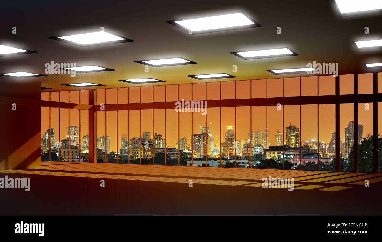 View of buildings from the last floor of high rise window at sunset ...