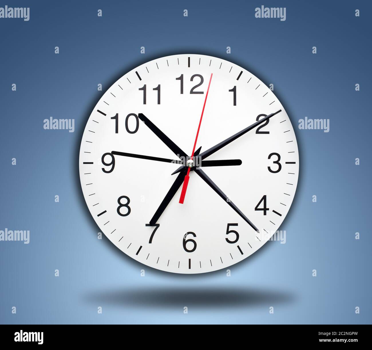White wall clock with many hands over blue background Stock Photo - Alamy