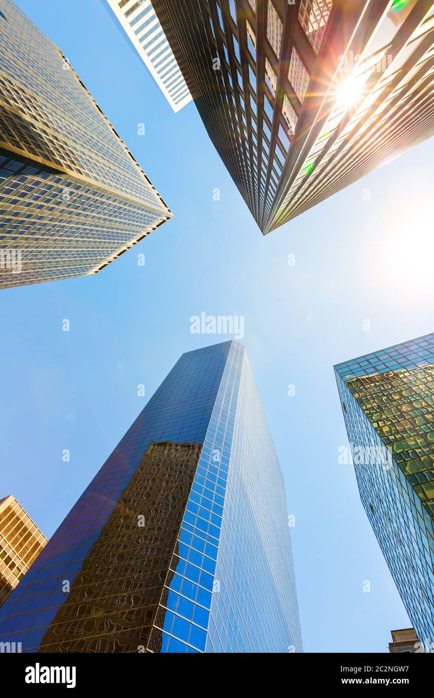 Bottom view on four skyscrapers. City landscape Stock Photo - Alamy