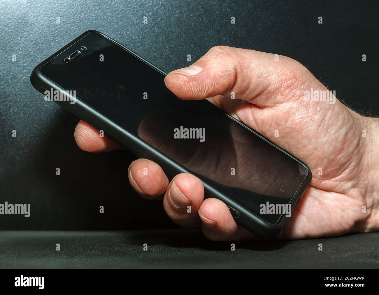 Hand with a mobile phone Stock Photo - Alamy