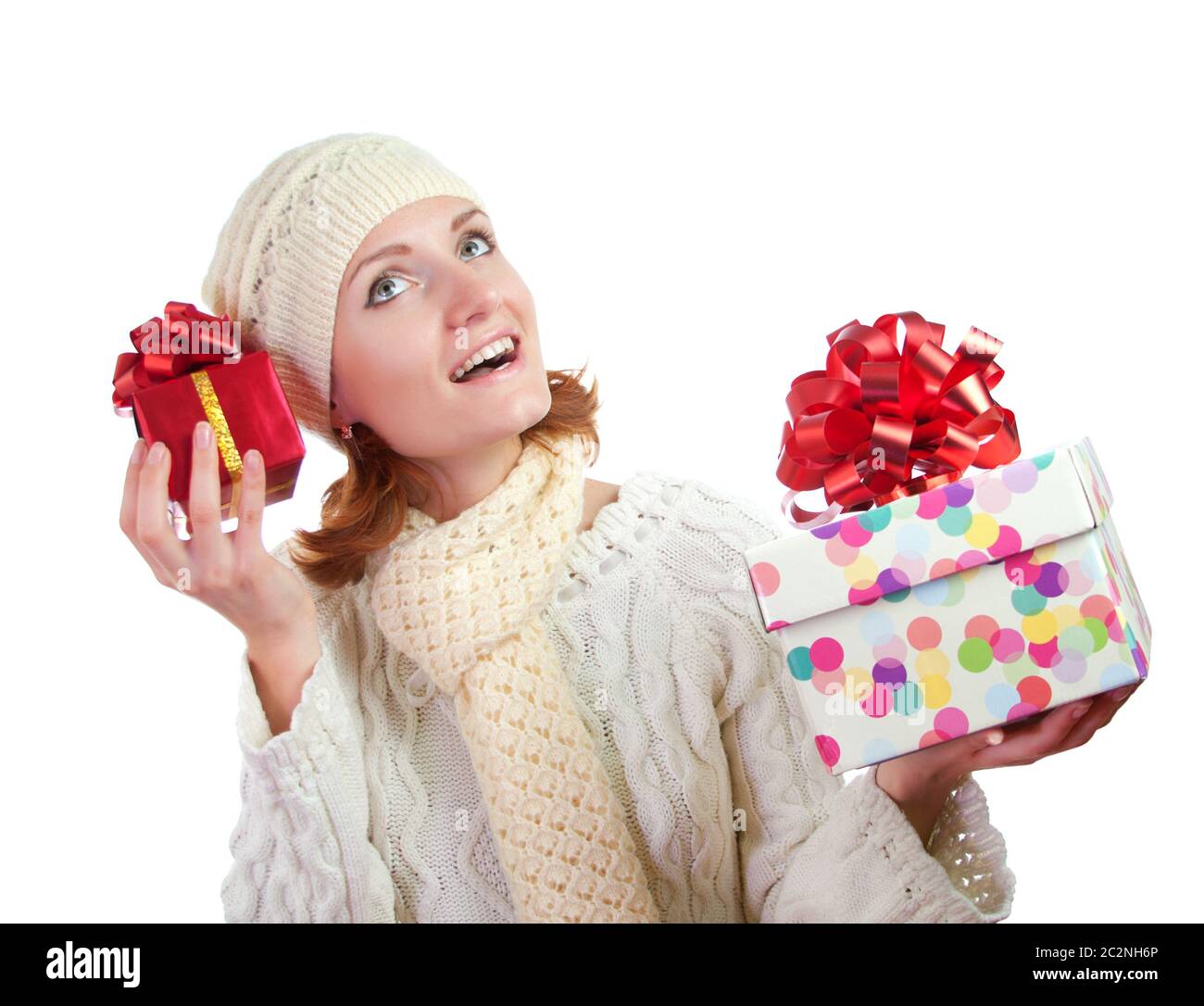 Happy smiling woman in hat with gifts. Isolated on white Stock Photo ...